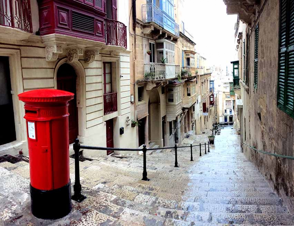 Those Little Specks of Red in the Maltese Landscape - Travel Junkie Girl